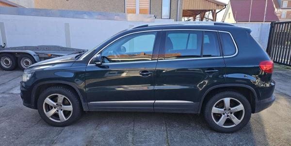 Green Volkswagen Tiguan 2012 in Kelme, with an engine capacity of 1.97 L and mileage of 236 thousand km for 6900 €, photo 8 on AUTOMOTO.COM.LV