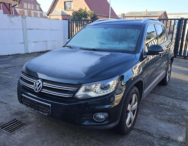 Green Volkswagen Tiguan 2012 in Kelme, with an engine capacity of 1.97 L and mileage of 236 thousand km for 6900 €, photo 9 on AUTOMOTO.COM.LV