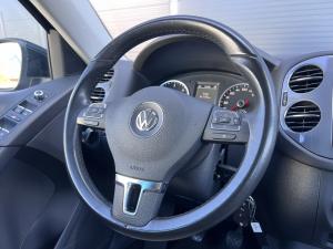 Green Volkswagen Tiguan 2012 in Riga, with an engine capacity of 2.00 L and mileage of 218 thousand km for 10550 €, photo 14 on AUTOMOTO.COM.LV