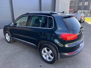 Green Volkswagen Tiguan 2012 in Riga, with an engine capacity of 2.00 L and mileage of 218 thousand km for 10550 €, photo 21 on AUTOMOTO.COM.LV