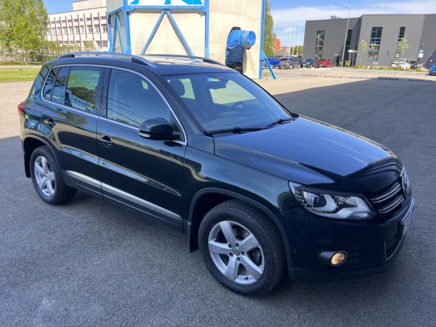 Green Volkswagen Tiguan 2012 in Riga, with an engine capacity of 2.00 L and mileage of 218 thousand km for 10550 €, photo 24 on AUTOMOTO.COM.LV