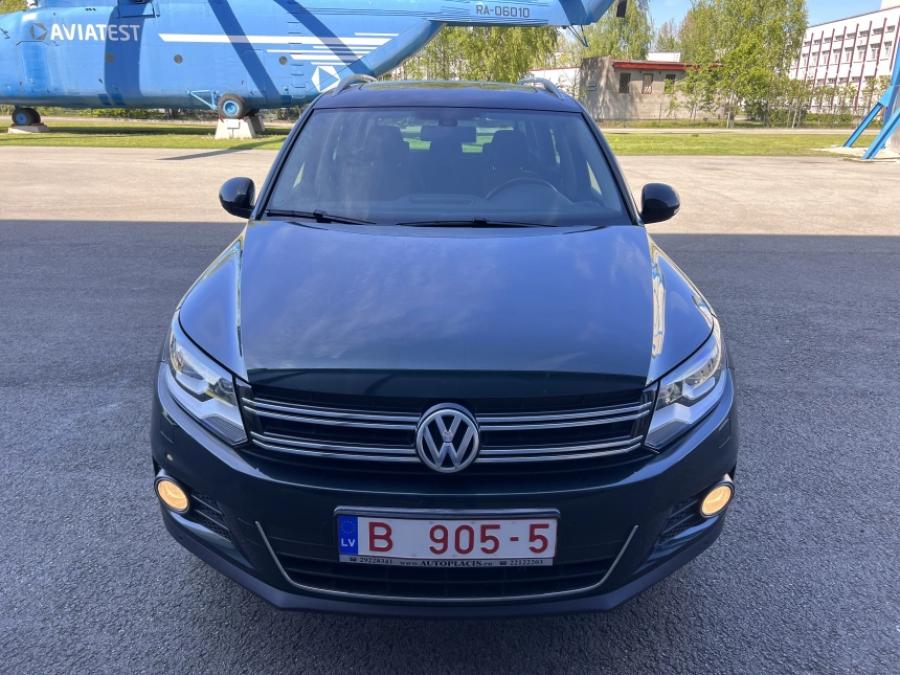 Green Volkswagen Tiguan 2012 in Riga, with an engine capacity of 2.00 L and mileage of 218 thousand km for 10550 €, photo 25 on AUTOMOTO.COM.LV