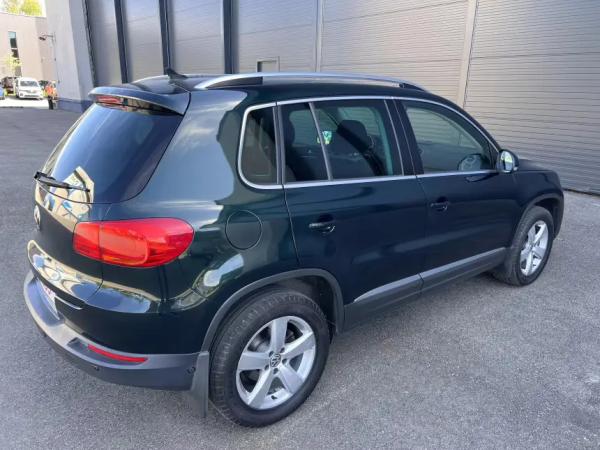 Green Volkswagen Tiguan 2012 in Riga, with an engine capacity of 2.00 L and mileage of 218 thousand km for 10550 €, photo 4 on AUTOMOTO.COM.LV