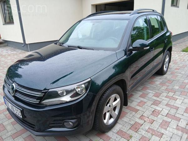 Green Volkswagen Tiguan 2013 in Jurmala, with an engine capacity of 2.00 L and mileage of 262 thousand km for 7995 €, photo 1 on AUTOMOTO.COM.LV