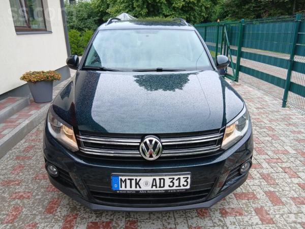 Green Volkswagen Tiguan 2013 in Jurmala, with an engine capacity of 2.00 L and mileage of 262 thousand km for 7995 €, photo 2 on AUTOMOTO.COM.LV