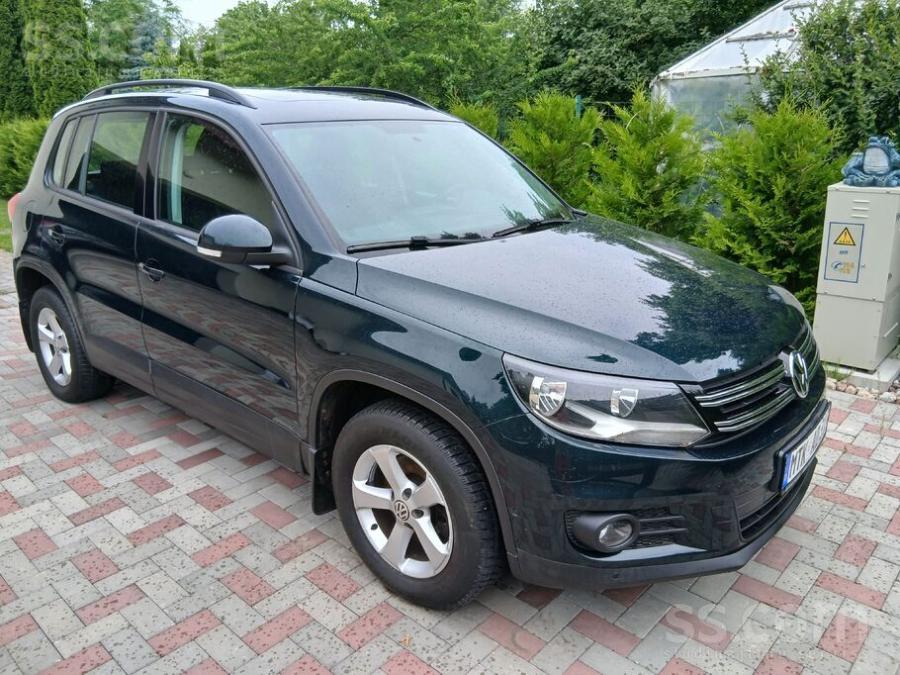 Green Volkswagen Tiguan 2013 in Jurmala, with an engine capacity of 2.00 L and mileage of 262 thousand km for 7995 €, photo 4 on AUTOMOTO.COM.LV