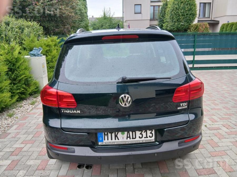 Green Volkswagen Tiguan 2013 in Jurmala, with an engine capacity of 2.00 L and mileage of 262 thousand km for 7995 €, photo 6 on AUTOMOTO.COM.LV