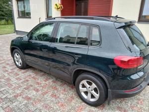 Green Volkswagen Tiguan 2013 in Jurmala, with an engine capacity of 2.00 L and mileage of 262 thousand km for 7995 €, photo 7 on AUTOMOTO.COM.LV