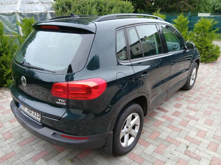 Green Volkswagen Tiguan 2013 in Jurmala, with an engine capacity of 2.00 L and mileage of 262 thousand km for 7995 €, photo 8 on AUTOMOTO.COM.LV