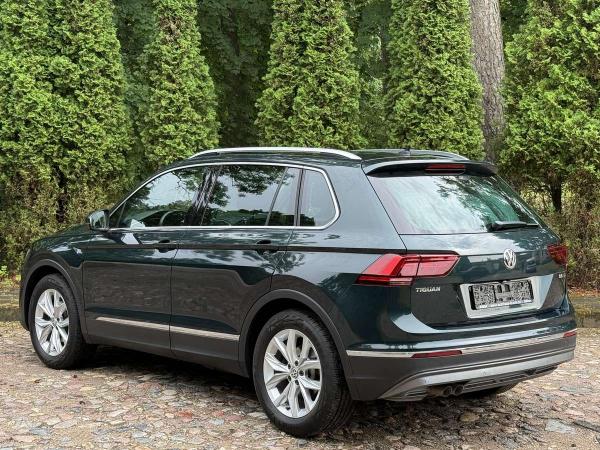 Green Volkswagen Tiguan 2017 in Kedainiai, with an engine capacity of 1.97 L and mileage of 236 thousand km for 15500 €, photo 4 on AUTOMOTO.COM.LV