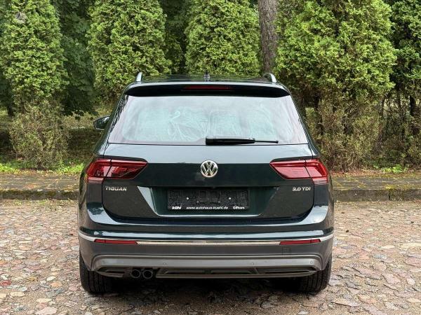 Green Volkswagen Tiguan 2017 in Kedainiai, with an engine capacity of 1.97 L and mileage of 236 thousand km for 15500 €, photo 5 on AUTOMOTO.COM.LV