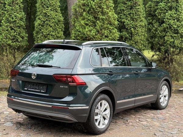 Green Volkswagen Tiguan 2017 in Kedainiai, with an engine capacity of 1.97 L and mileage of 236 thousand km for 15500 €, photo 6 on AUTOMOTO.COM.LV