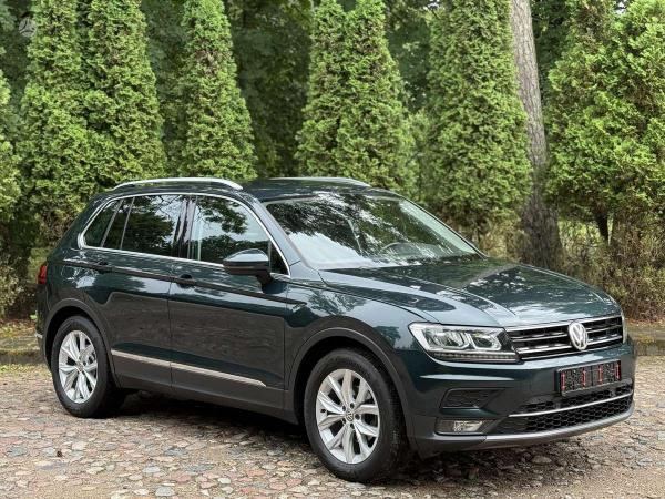 Green Volkswagen Tiguan 2017 in Kedainiai, with an engine capacity of 1.97 L and mileage of 236 thousand km for 15500 €, photo 8 on AUTOMOTO.COM.LV