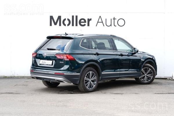 Green Volkswagen Tiguan 2019 in Riga, with an engine capacity of 2.00 L and mileage of 203 thousand km for 17950 €, photo 4 on AUTOMOTO.COM.LV