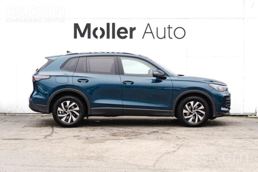 Green Volkswagen Tiguan 2024 in Riga, with an engine capacity of 1.50 L and mileage of 65 thousand km for 28950 €, photo 5 on AUTOMOTO.COM.LV