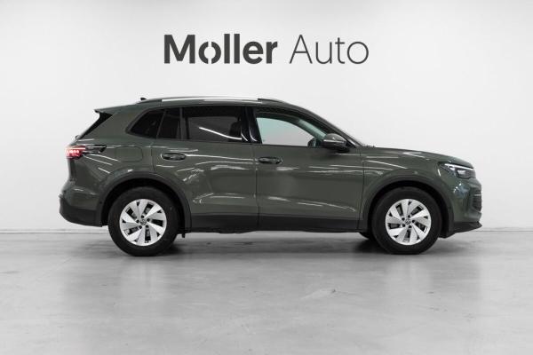 Green Volkswagen Tiguan 2024 in Vilnius, with an engine capacity of 2.00 L and mileage of 73 thousand km for 29500 €, photo 5 on AUTOMOTO.COM.LV