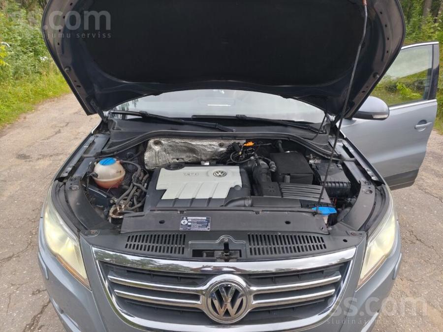 Pelēks Volkswagen Tiguan 2008 Rīga, ar dzinēja tilpumu 2.00 L un nobraukumu 311 tūkst. km par 5700 €, foto 14 vietnē AUTOMOTO.COM.LV