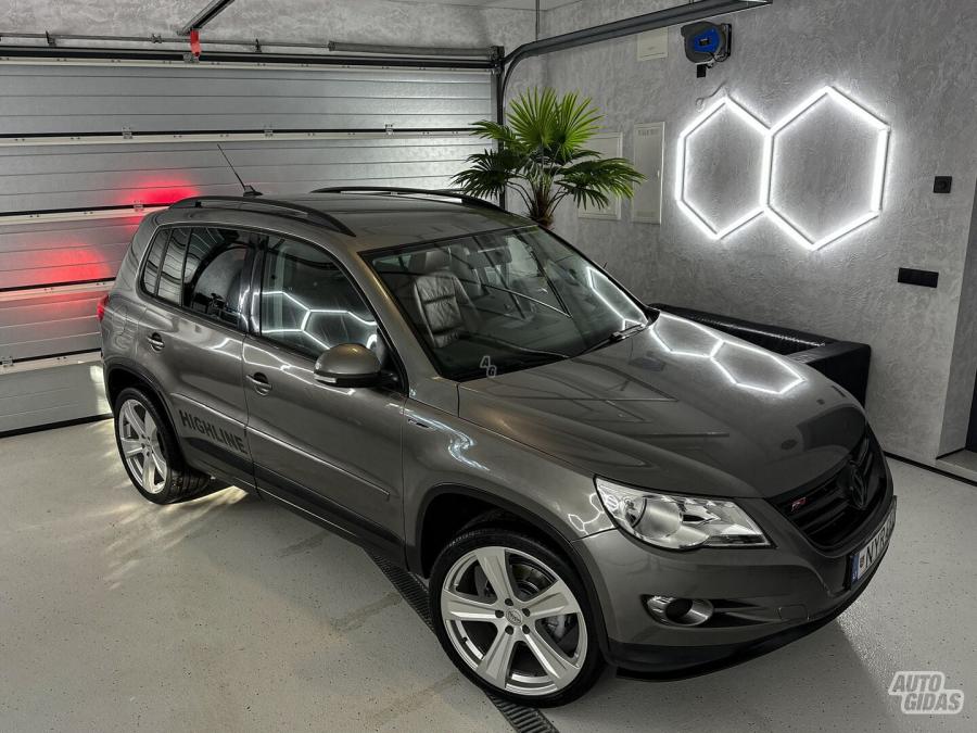 Grey Volkswagen Tiguan 2009 in Kaunas, with an engine capacity of 2.00 L and mileage of 277 thousand km for 6950 €, photo 12 on AUTOMOTO.COM.LV