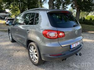 Grey Volkswagen Tiguan 2009 in Riga, with an engine capacity of 2.00 L and mileage of 232 thousand km for 6290 €, photo 4 on AUTOMOTO.COM.LV