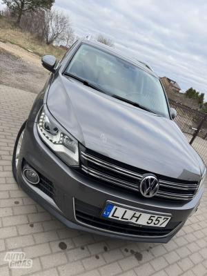 Grey Volkswagen Tiguan 2011 in Vilnius, with an engine capacity of 1.40 L and mileage of 230 thousand km for 8300 €, photo  on AUTOMOTO.COM.LV