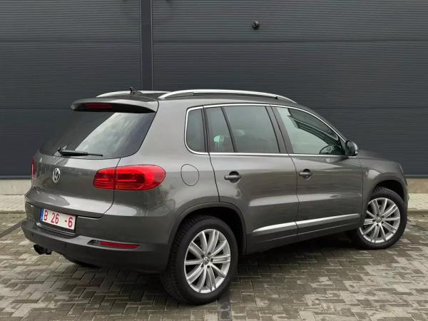 Grey Volkswagen Tiguan 2011 in Riga, with an engine capacity of 2.00 L and mileage of 253 thousand km for 10990 €, photo 5 on AUTOMOTO.COM.LV