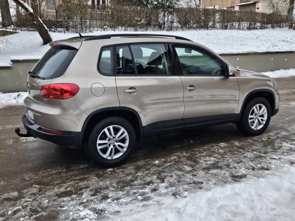 Grey Volkswagen Tiguan 2011 in Jekabpils, with an engine capacity of 1.40 L and mileage of 114 thousand km for 7200 €, photo 5 on AUTOMOTO.COM.LV