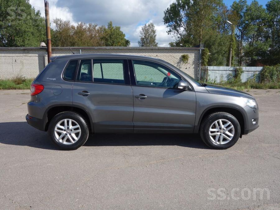 Grey Volkswagen Tiguan 2011 in Riga, with an engine capacity of 2.00 L and mileage of 220 thousand km for 6950 €, photo 13 on AUTOMOTO.COM.LV