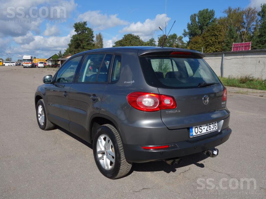 Grey Volkswagen Tiguan 2011 in Riga, with an engine capacity of 2.00 L and mileage of 220 thousand km for 6950 €, photo 15 on AUTOMOTO.COM.LV
