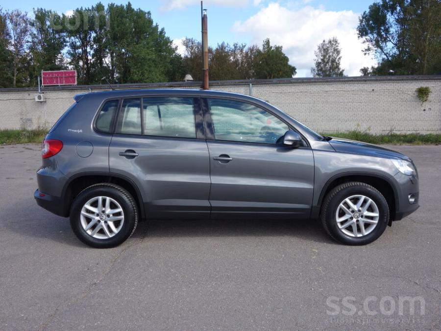 Grey Volkswagen Tiguan 2011 in Riga, with an engine capacity of 2.00 L and mileage of 220 thousand km for 6950 €, photo 26 on AUTOMOTO.COM.LV