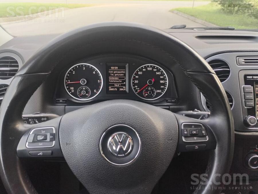 Pelēks Volkswagen Tiguan 2011 Rīga, ar dzinēja tilpumu 2.00 L un nobraukumu 201 tūkst. km par 7650 €, foto 14 vietnē AUTOMOTO.COM.LV