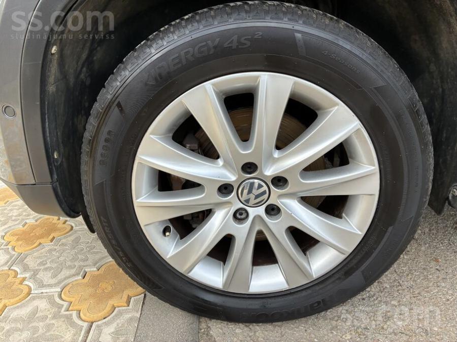 Grey Volkswagen Tiguan 2011 in Daugavpils, with an engine capacity of 2.00 L and mileage of 0 thousand km for 6750 €, photo 21 on AUTOMOTO.COM.LV
