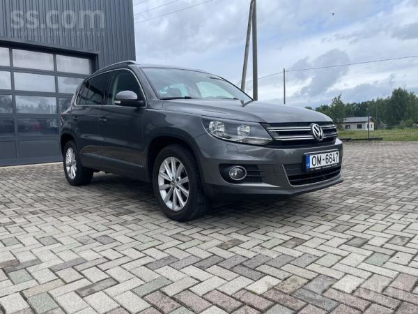 Grey Volkswagen Tiguan 2012 in Ogre, with an engine capacity of 2.00 L and mileage of 238 thousand km for 9970 €, photo 6 on AUTOMOTO.COM.LV
