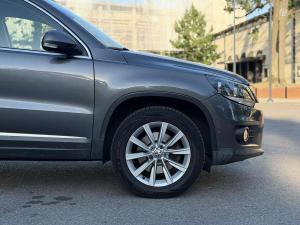 Grey Volkswagen Tiguan 2012 in Taurage, with an engine capacity of 1.97 L and mileage of 185 thousand km for 8300 €, photo 14 on AUTOMOTO.COM.LV
