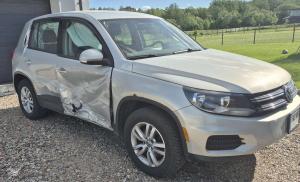 Grey Volkswagen Tiguan 2013 in Marijampole, with an engine capacity of 1.98 L and mileage of 230 thousand km for 3200 €, photo 5 on AUTOMOTO.COM.LV