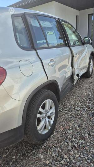 Grey Volkswagen Tiguan 2013 in Marijampole, with an engine capacity of 1.98 L and mileage of 230 thousand km for 3200 €, photo 8 on AUTOMOTO.COM.LV