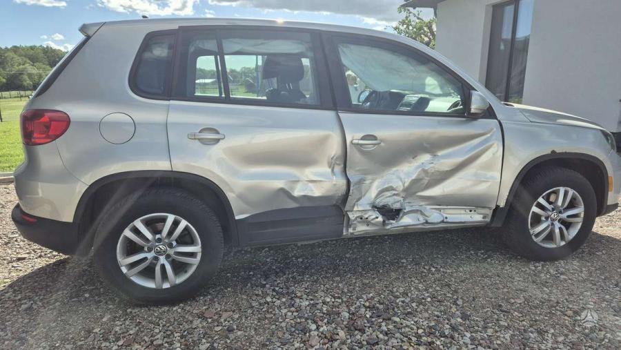 Grey Volkswagen Tiguan 2013 in Marijampole, with an engine capacity of 1.98 L and mileage of 230 thousand km for 3200 €, photo 13 on AUTOMOTO.COM.LV