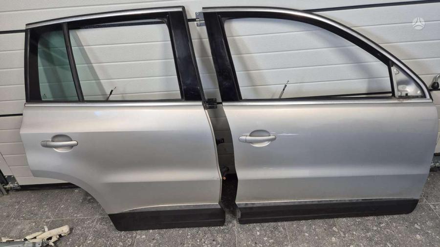 Grey Volkswagen Tiguan 2013 in Marijampole, with an engine capacity of 1.98 L and mileage of 230 thousand km for 3200 €, photo 16 on AUTOMOTO.COM.LV