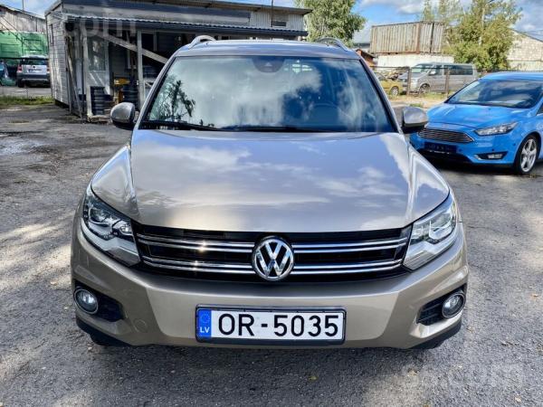 Grey Volkswagen Tiguan 2013 in Riga, with an engine capacity of 2.00 L and mileage of 0 thousand km for 8590 €, photo 3 on AUTOMOTO.COM.LV