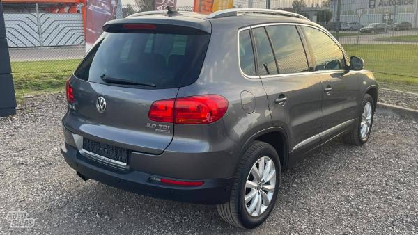 Grey Volkswagen Tiguan 2013 in Marijampole, with an engine capacity of 2.00 L and mileage of 256 thousand km for 9190 €, photo 4 on AUTOMOTO.COM.LV