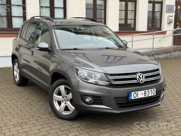 Grey Volkswagen Tiguan 2014 in Jelgava, with an engine capacity of 2.00 L and mileage of 243 thousand km for 9900 €, photo 2 on AUTOMOTO.COM.LV