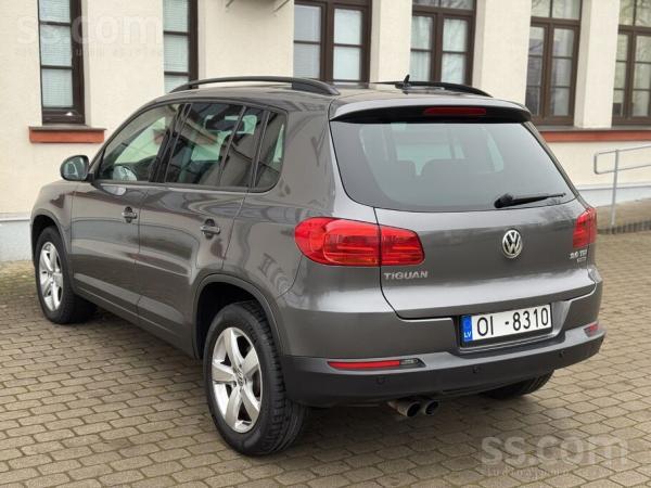 Grey Volkswagen Tiguan 2014 in Jelgava, with an engine capacity of 2.00 L and mileage of 243 thousand km for 9900 €, photo 5 on AUTOMOTO.COM.LV