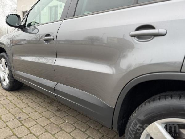 Grey Volkswagen Tiguan 2014 in Jelgava, with an engine capacity of 2.00 L and mileage of 243 thousand km for 9900 €, photo 7 on AUTOMOTO.COM.LV
