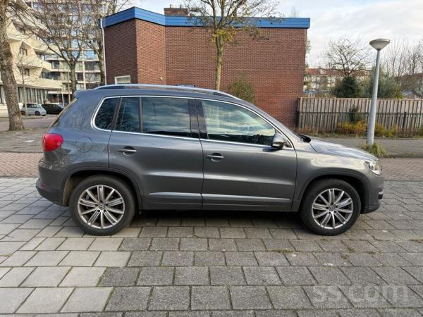 Grey Volkswagen Tiguan 2014 in Cesis, with an engine capacity of 1.40 L and mileage of 0 thousand km for 8500 €, photo 4 on AUTOMOTO.COM.LV