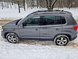 Grey Volkswagen Tiguan 2014 in Vilnius, with an engine capacity of 1.98 L and mileage of 234 thousand km for 5300 €, photo  on AUTOMOTO.COM.LV