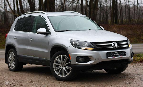 Grey Volkswagen Tiguan 2014 in Kretinga, with an engine capacity of 1.98 L and mileage of 205 thousand km for 8999 €, photo 1 on AUTOMOTO.COM.LV