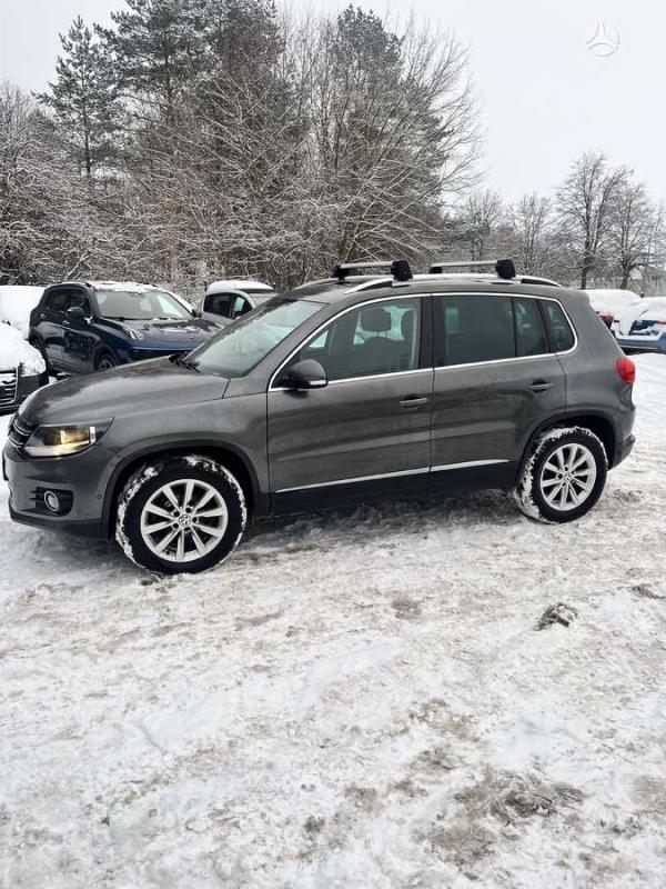 Grey Volkswagen Tiguan 2014 in Kaunas, with an engine capacity of 1.98 L and mileage of 88 thousand km for 10200 €, photo 1 on AUTOMOTO.COM.LV