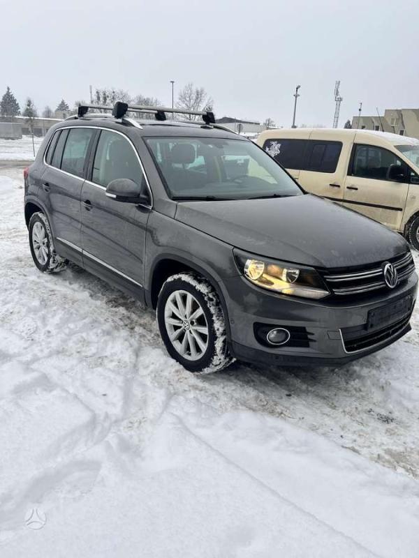 Grey Volkswagen Tiguan 2014 in Kaunas, with an engine capacity of 1.98 L and mileage of 88 thousand km for 10200 €, photo 2 on AUTOMOTO.COM.LV