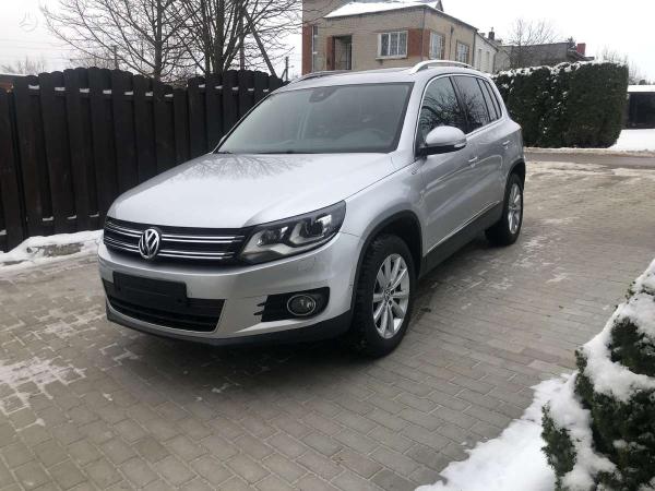 Grey Volkswagen Tiguan 2014 in Utena, with an engine capacity of 1.98 L and mileage of 147 thousand km for 9800 €, photo 1 on AUTOMOTO.COM.LV