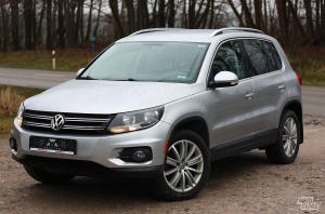 Grey Volkswagen Tiguan 2014 in Petrikaiciai, with an engine capacity of 2.00 L and mileage of 205 thousand km for 8999 €, photo 3 on AUTOMOTO.COM.LV