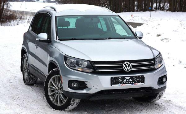 Grey Volkswagen Tiguan 2014 in Kretinga, with an engine capacity of 1.98 L and mileage of 205 thousand km for 8999 €, photo 1 on AUTOMOTO.COM.LV
